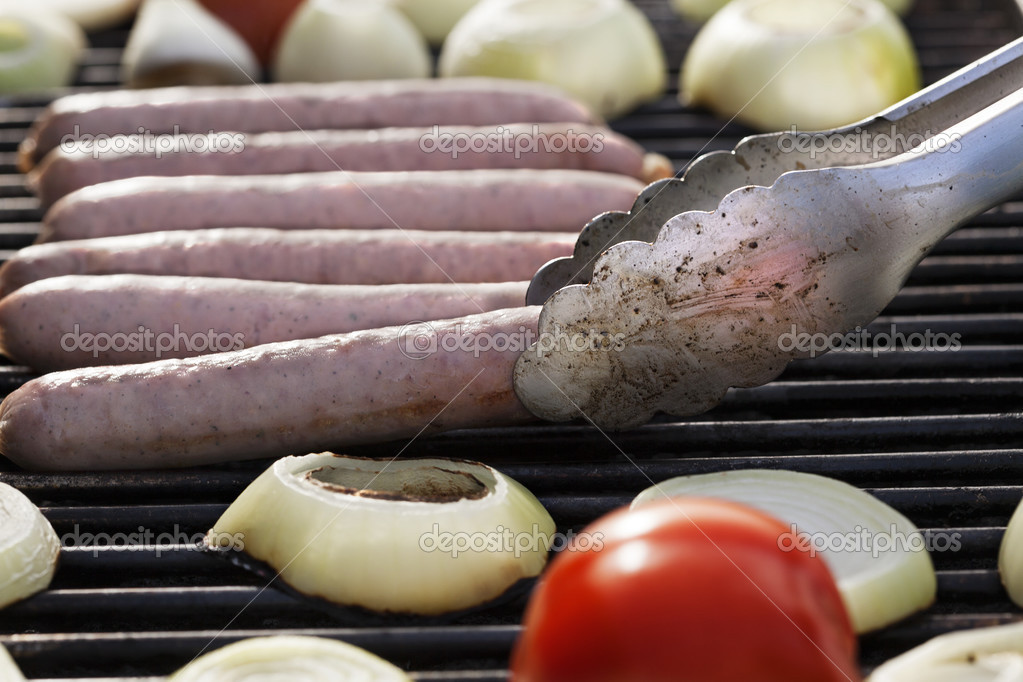 Lifting a Sausage Stock Photo by ©eldadcarin 22401361