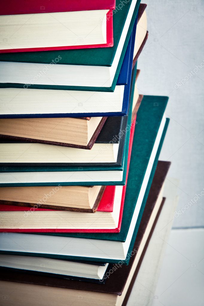 Very high stack of books on a table — Stock Photo © aetb #26005099