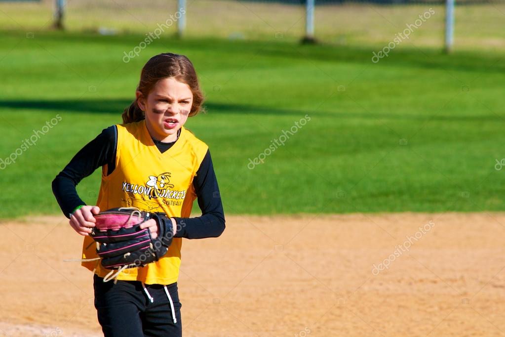 Softball Player Running Off the Field Stock Photo by ©mcharles999 22768610