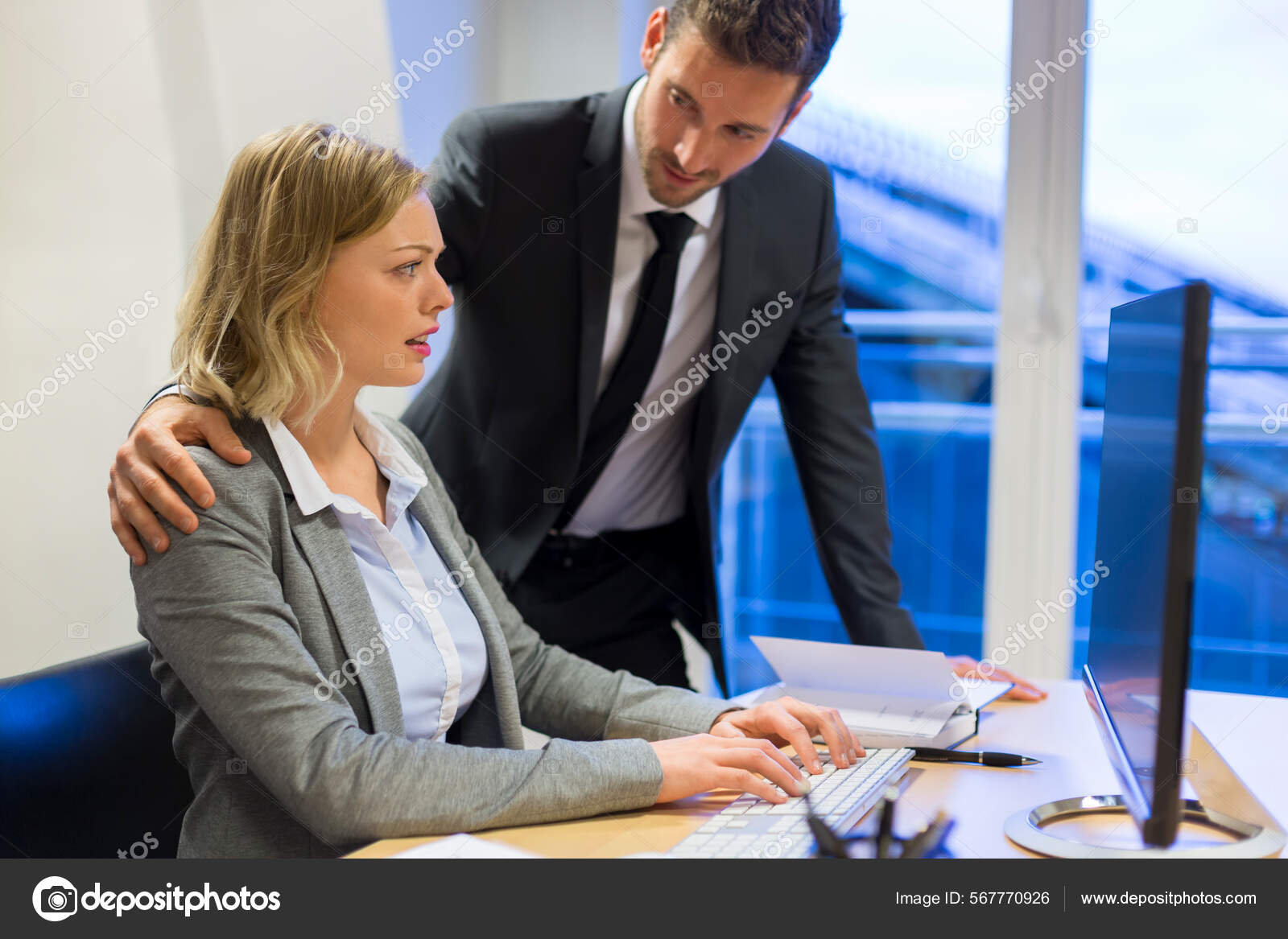 Businessman Harassing His Colleague Work — Stock Photo © LDProd #567770926