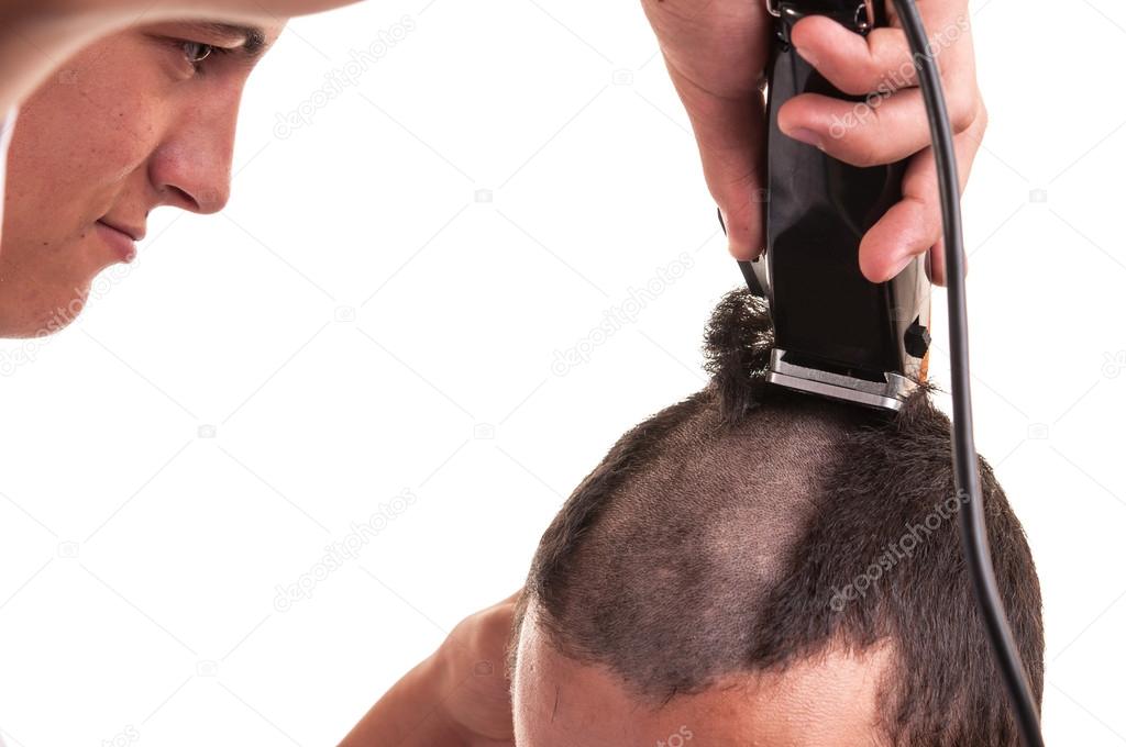 Barber cutting hair with clipper on white Stock Photo by ©axentevlad ...