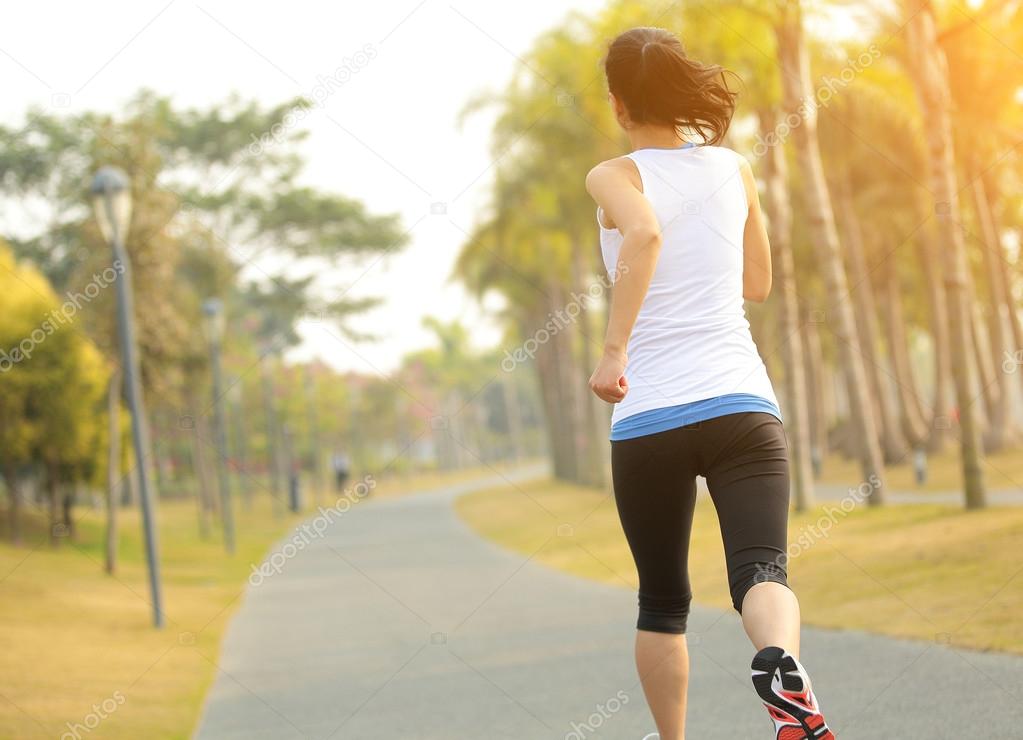 Woman running Stock Photo by ©lzf 41345607