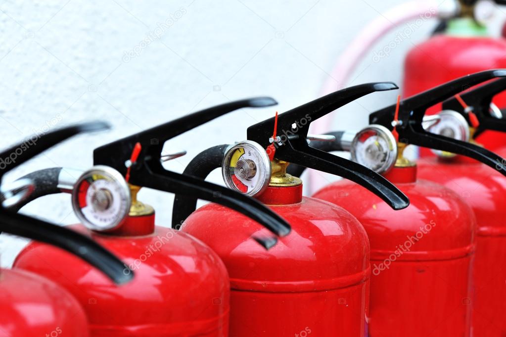 Red fire extinguisher — Stock Photo © lzf #42444183