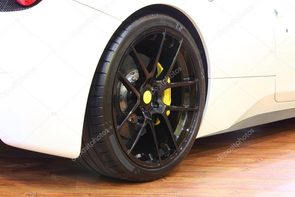 Back wheel of a bright white super car – Stock Editorial Photo ...
