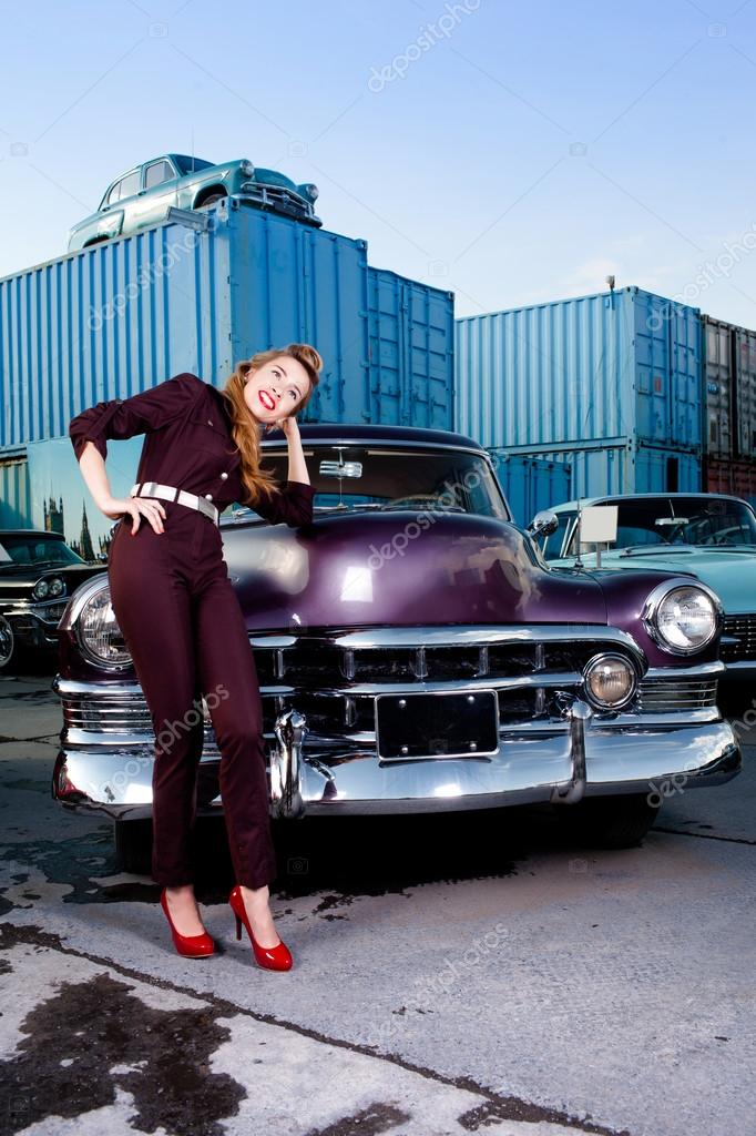 Girl in pin-up on a background of retro cars. parking – Stock Editorial ...
