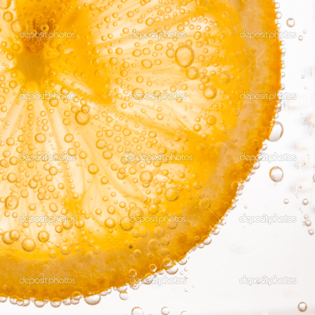Close-up of lemon slice in clear water — Stock Photo © fotomaximum ...