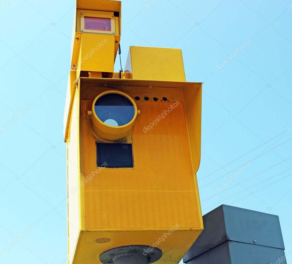 Speed camera and Traffic Light on Green against a Blue Sky Stock Photo ...