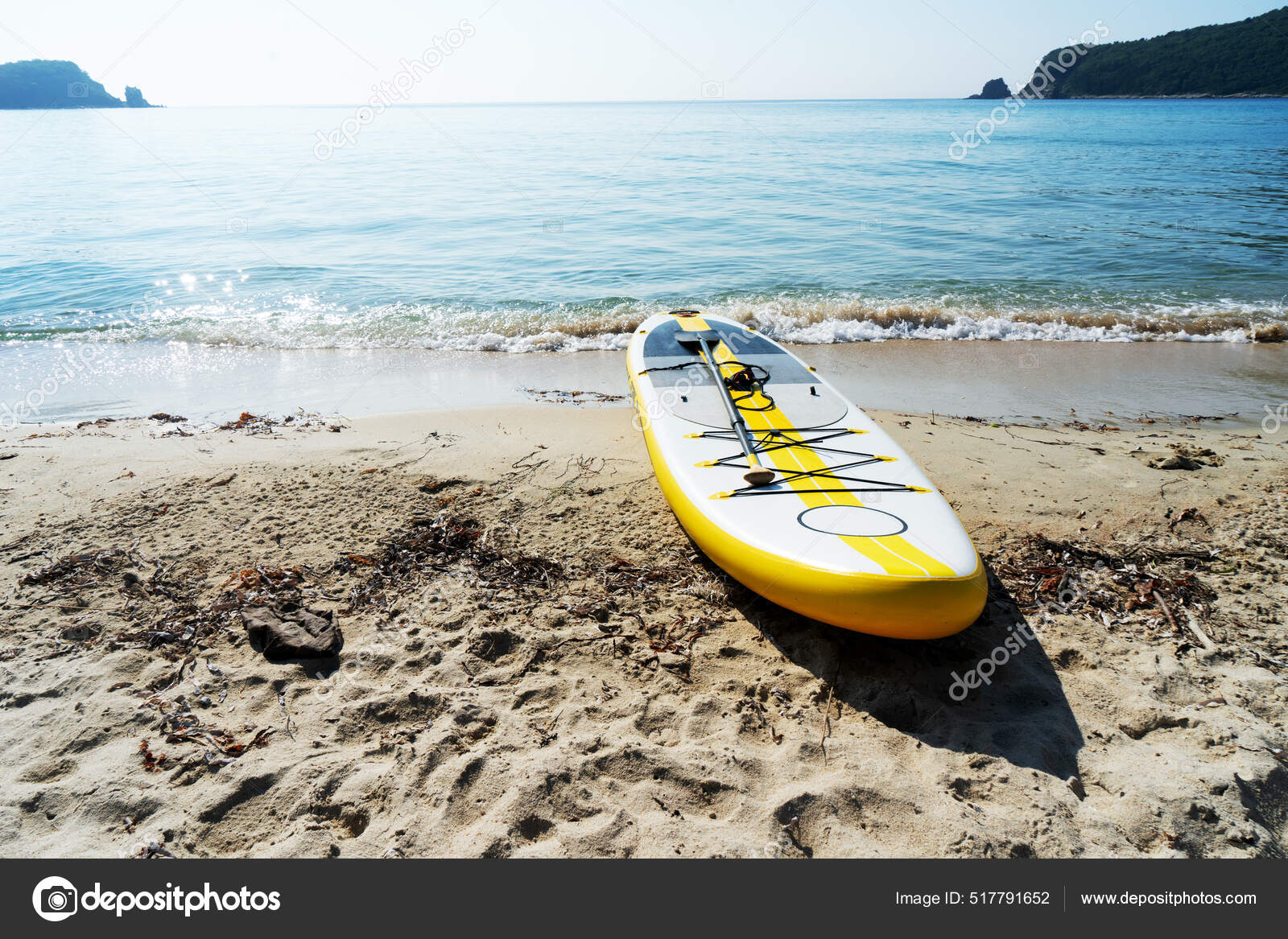 Empty seaside landscape sea sand beach with supboard on coast calm wave ...