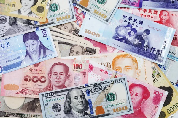 Background of banknotes from different countries. U.S. dollar, Chinese ...