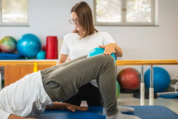 Physiotherapy exercise Stock Photos, Royalty Free Physiotherapy exercise Images | Depositphotos