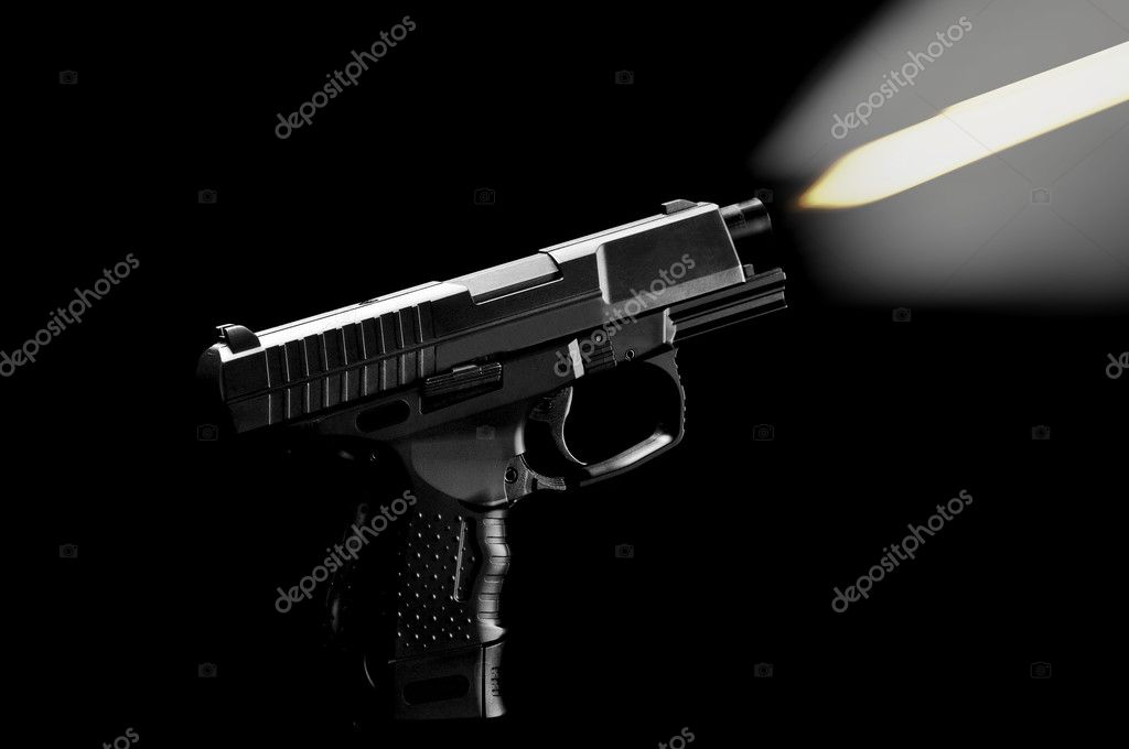The black gun isolated on black background Stock Photo by ©Vitaly.R ...