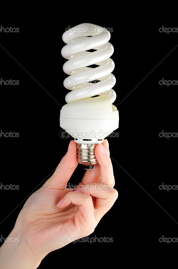 Hand holding a bulb Stock Photo by ©Vitaly.R 23520563