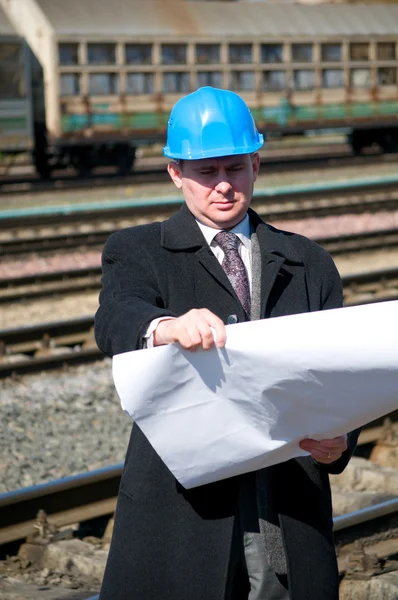 Engineer with drawing - Stock Image - Everypixel