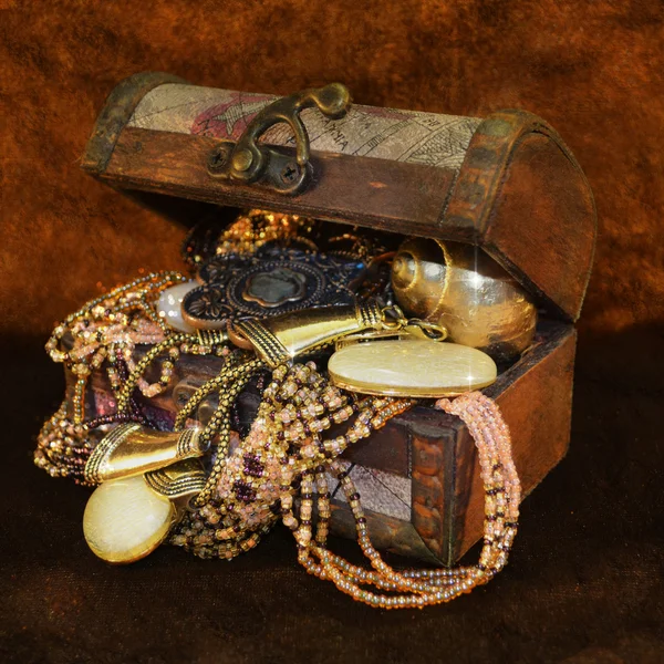 Wooden treasure chest with valuables - Stock Image - Everypixel