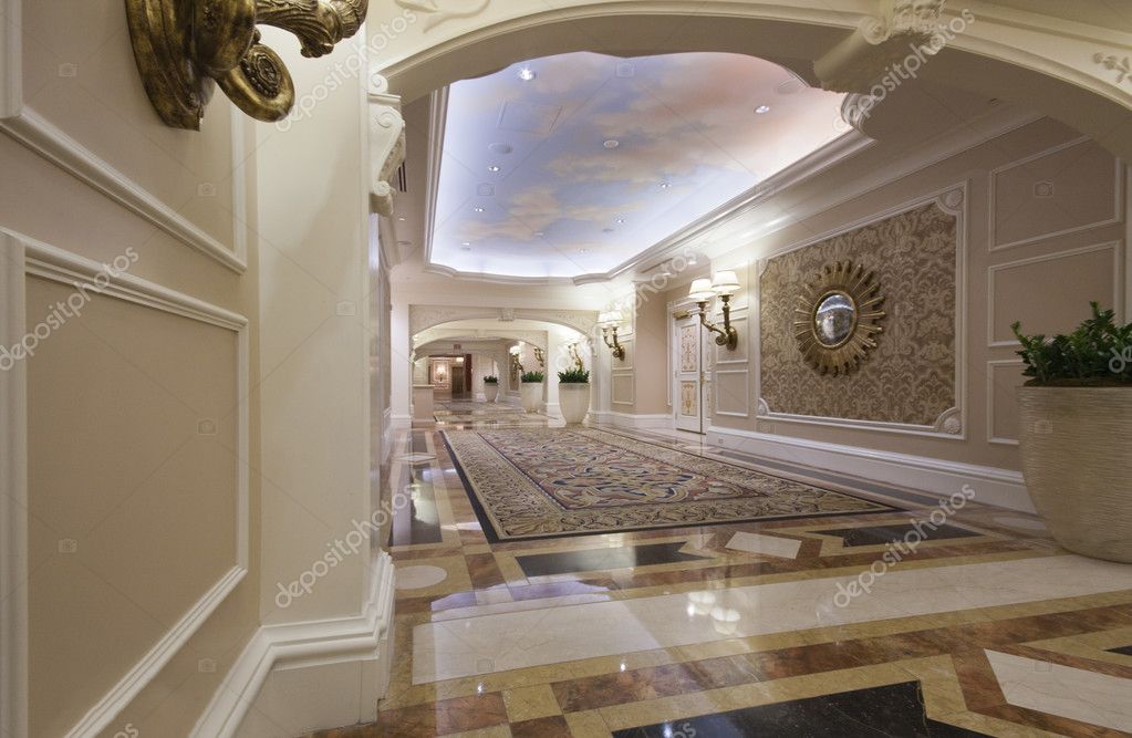 Classic wide corridor with marble floor and carpet — Stock Photo ...