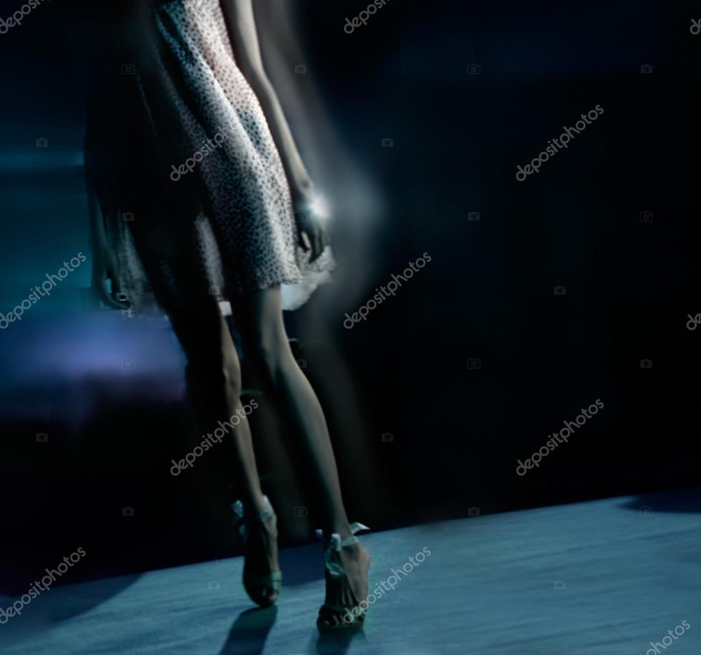Blurred model legs at the fashion show — Stock Photo © Kalcutta #26969435