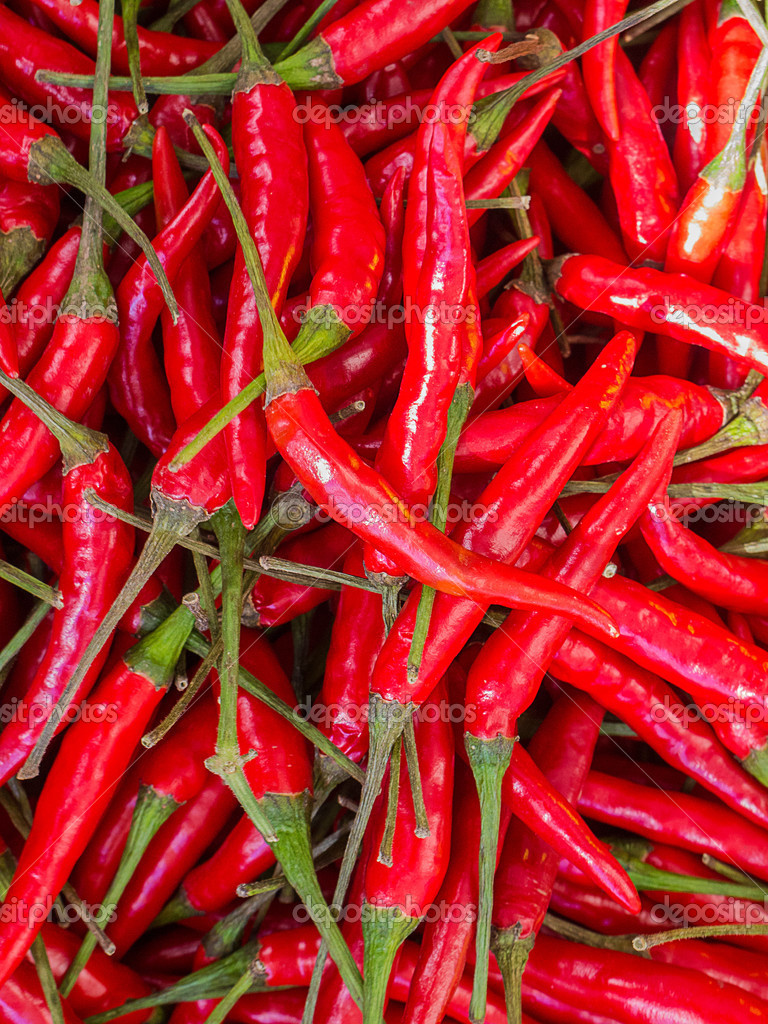 Red chilli background — Stock Photo © DarrenGreen #24929435