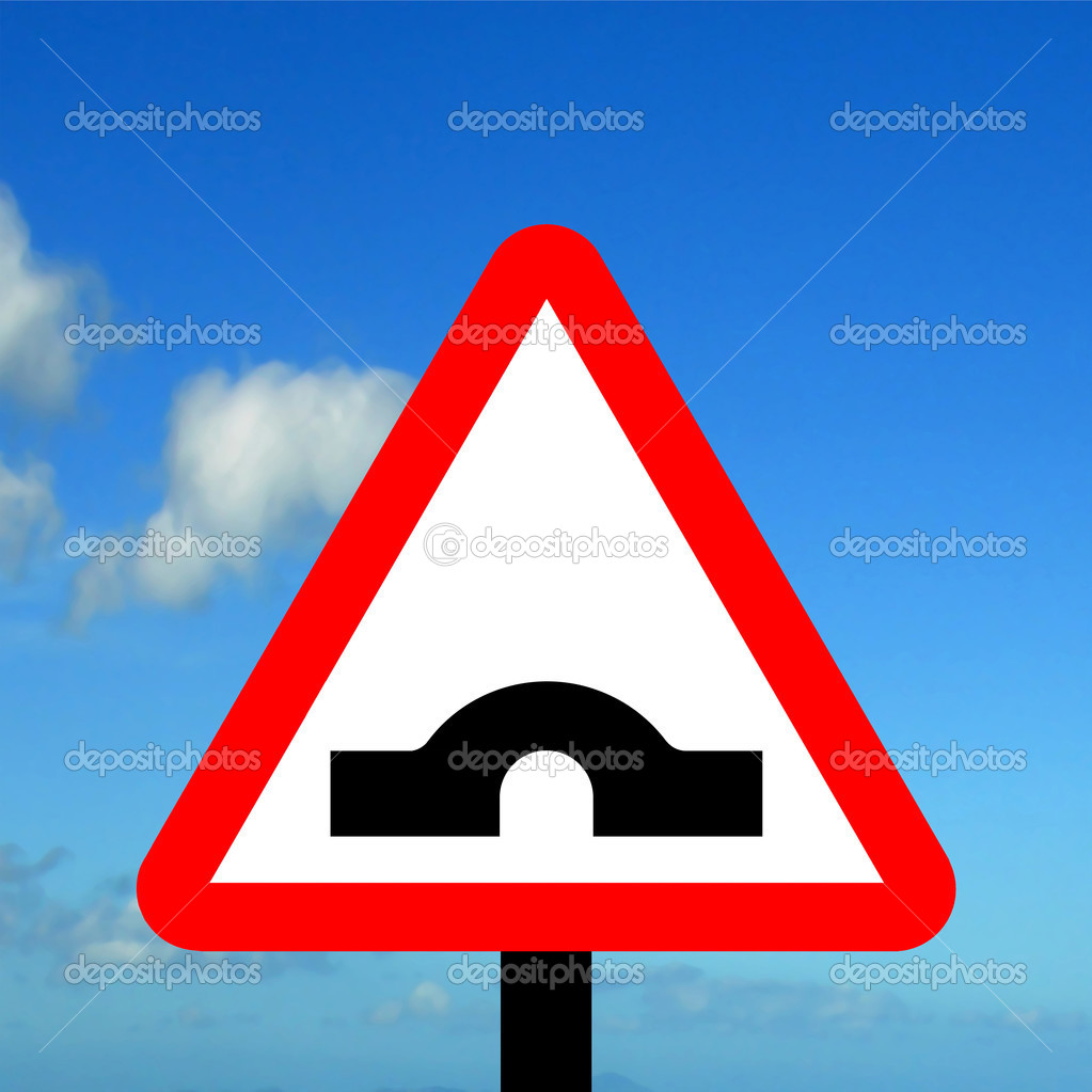 Warning triangle Hump bridge — Stock Photo © PeterEtchells #23964431