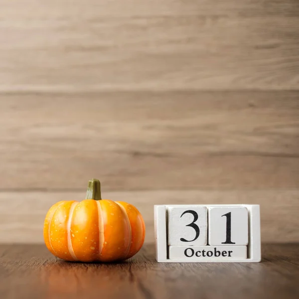 Happy Halloween day with pumpkin and 31 October calendar. Trick or ...