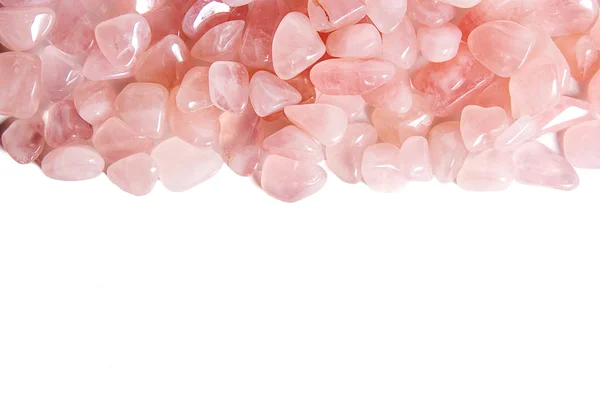 Pink quartz pile isolated on white background Stock Photo by ...
