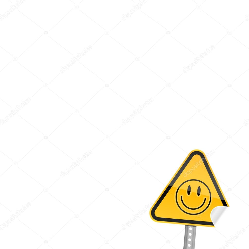 Small yellow road warning sign with smiley symbol with curved corner ...