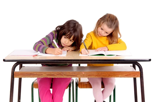 Two girls sitting at school desk Stock Photos, Royalty Free Two girls ...