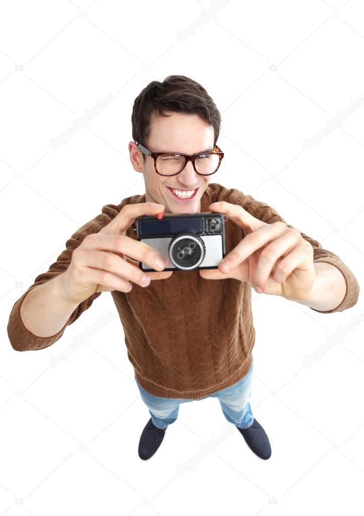 Geeky man with vintage camera — Stock Photo © pikselstock #23697991