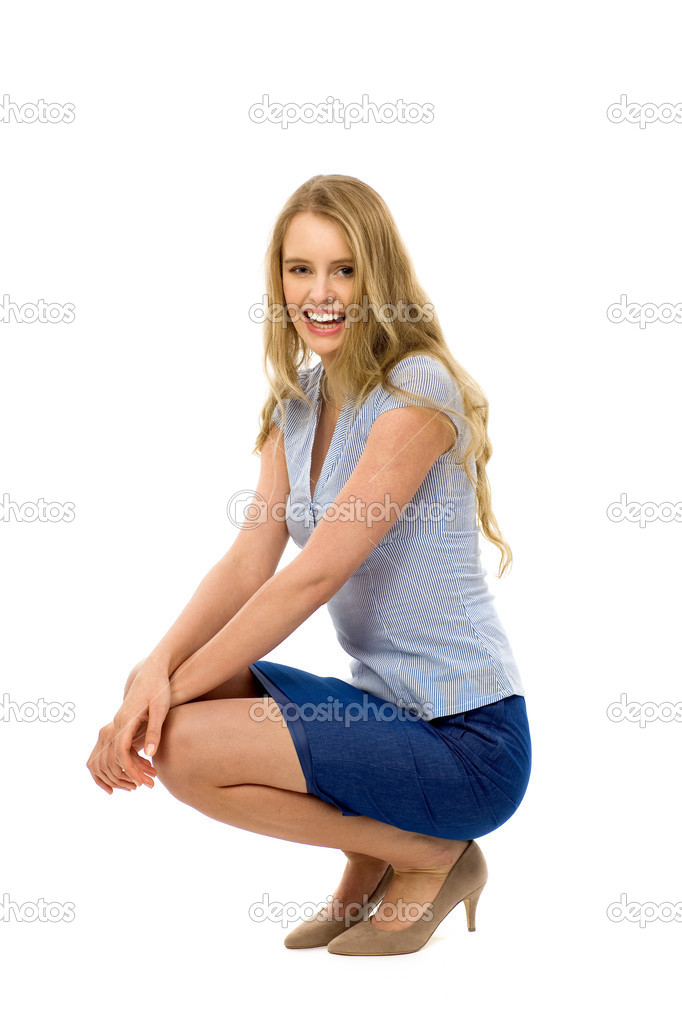 Young woman crouching Stock Photo by ©pikselstock 27340765