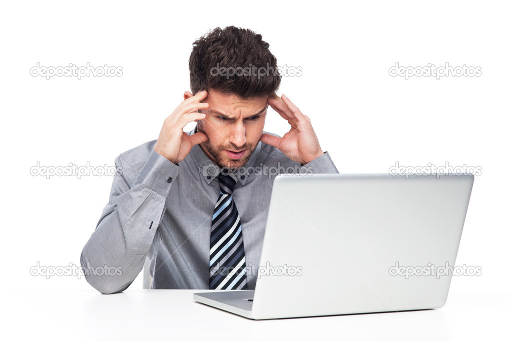 Stressed man looking at laptop — Stock Photo © pikselstock #47025455