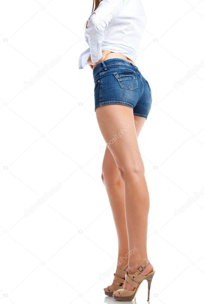 Sexy Woman Legs In Denim Shorts Isolated On White Background ⬇ Stock