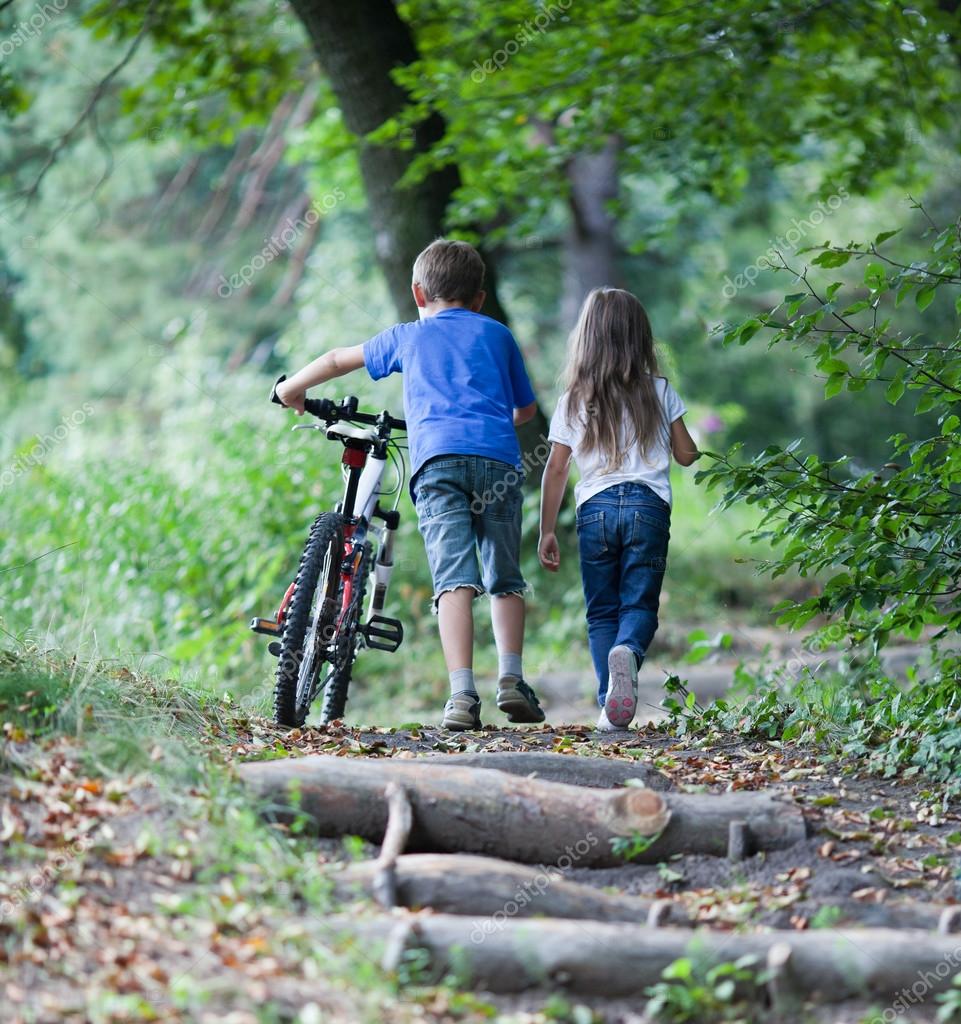 Children in forest — Stock Photo © waldru #23705131