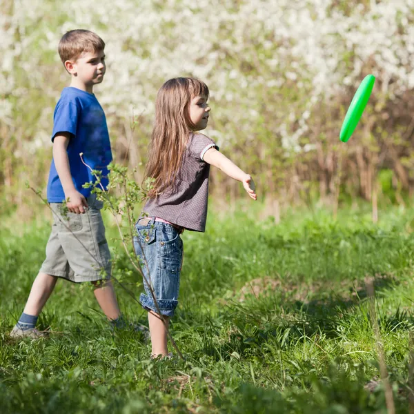 Kids playing outside summer time Stock Photos, Royalty Free Kids ...