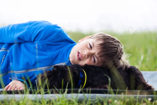 Boy and his dog relaxing in hammock Stock Photo by ©waldru 85150930