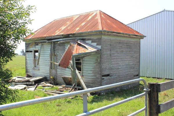 Old rusting broken down farm house on rural Australian property - Stock ...