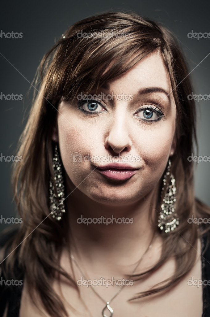 Caucasian Woman Making A Whatever Face — Stock Photo © Camrocker #24025549