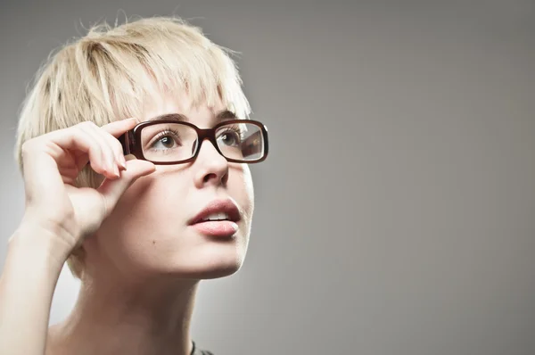 Woman Looking Over Her Glasses Stock Photo by ©creatista 39606795
