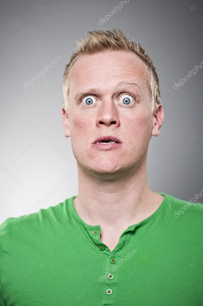 Wide Eyed Crazy Young Man Portrait — Stock Photo © Camrocker #26907033