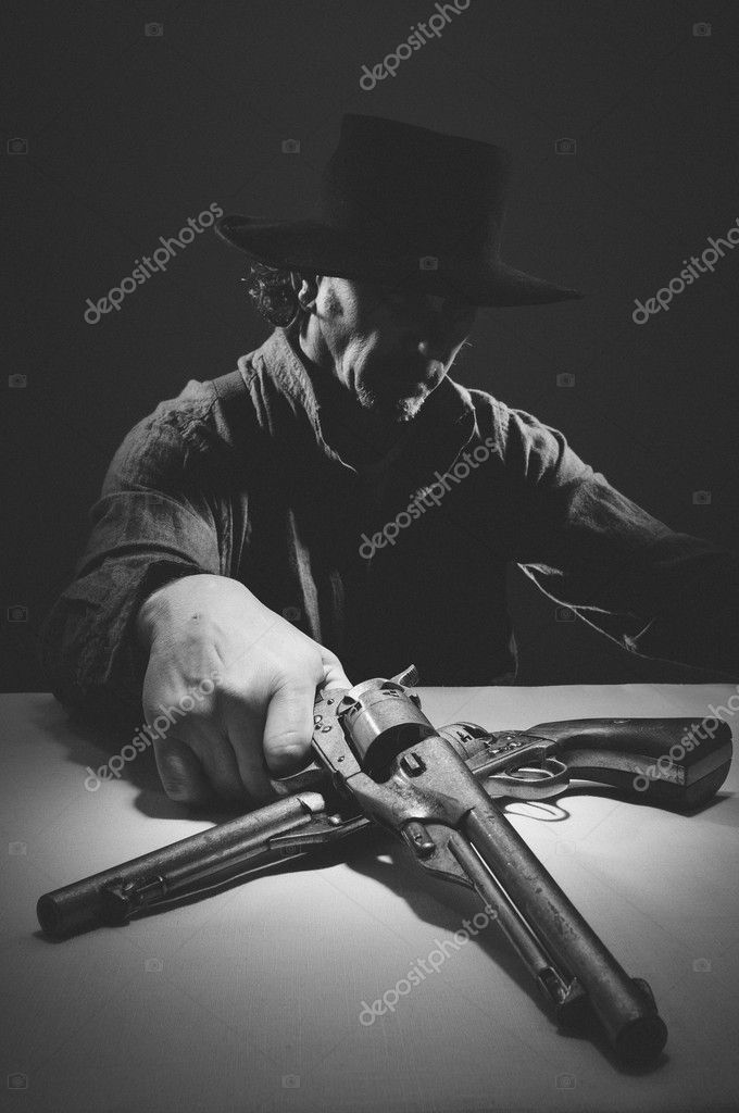Wild west Gunslinger Stock Photo by ©Camrocker 49540867