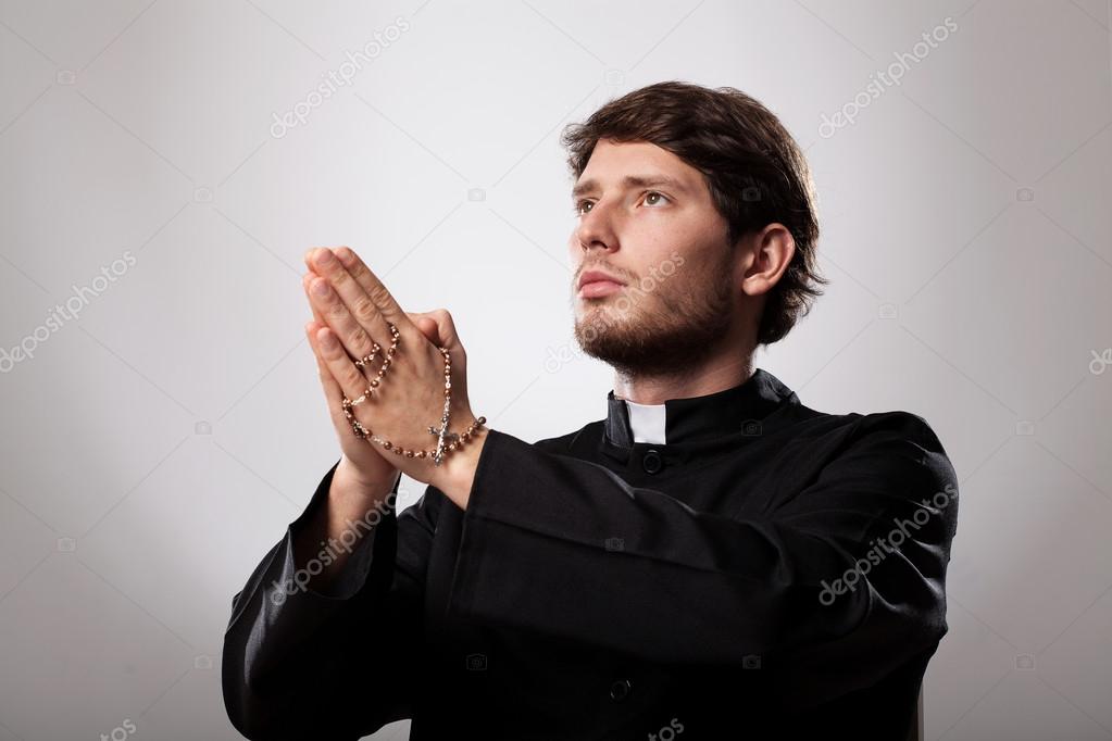 Priest is praying — Stock Photo © photographee.eu #42132785