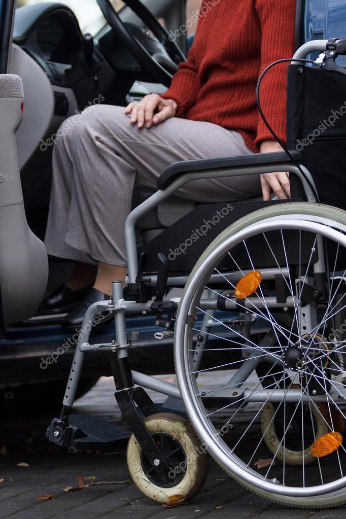 Disabled lady ready to drive Stock Photo by ©photographee.eu 45865587