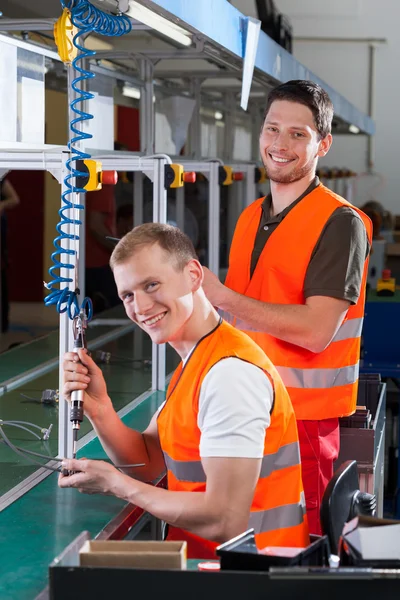 Factory workers on the production line Stock Photo by ©photographee.eu ...