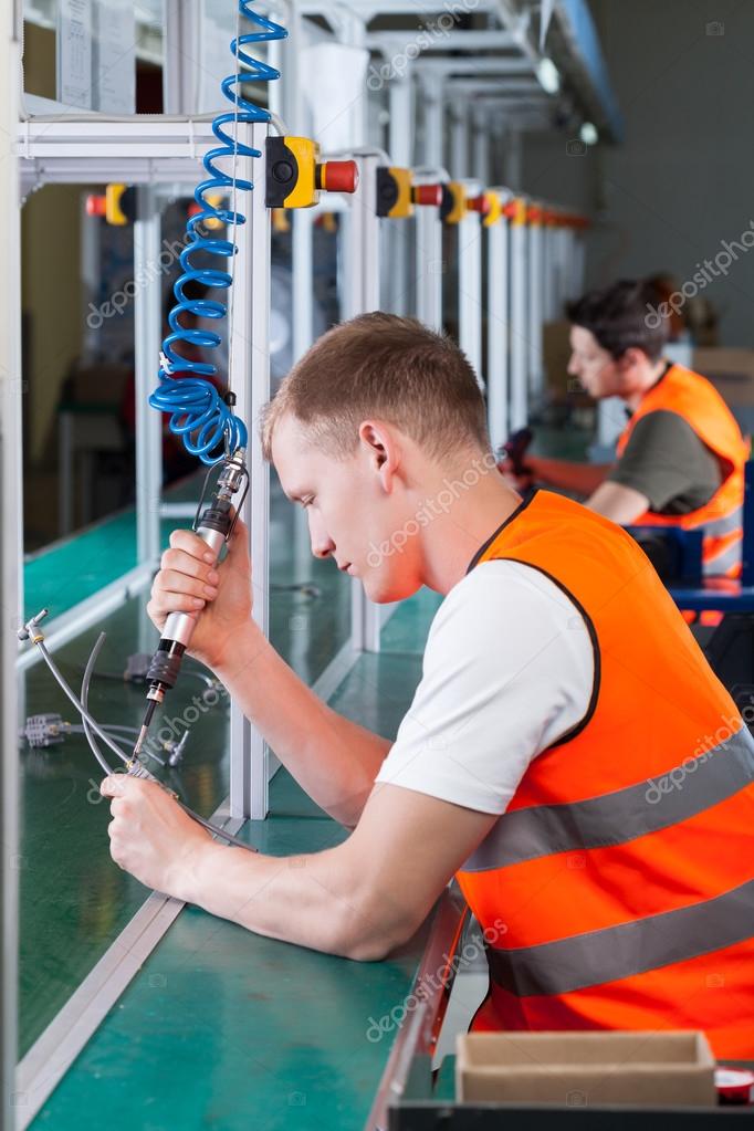 Factory workers on the production line Stock Photo by ©photographee.eu ...