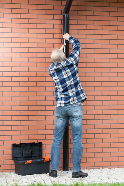 Fixing gutters Stock Photos, Royalty Free Fixing gutters Images ...