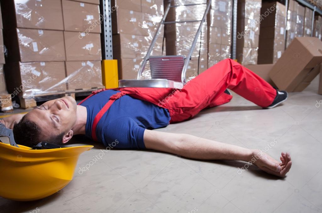 Unconscious worker after falling from a ladder — Stock Photo ...