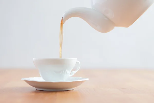 Pouring tea Stock Photos, Royalty Free Pouring tea Images | Depositphotos