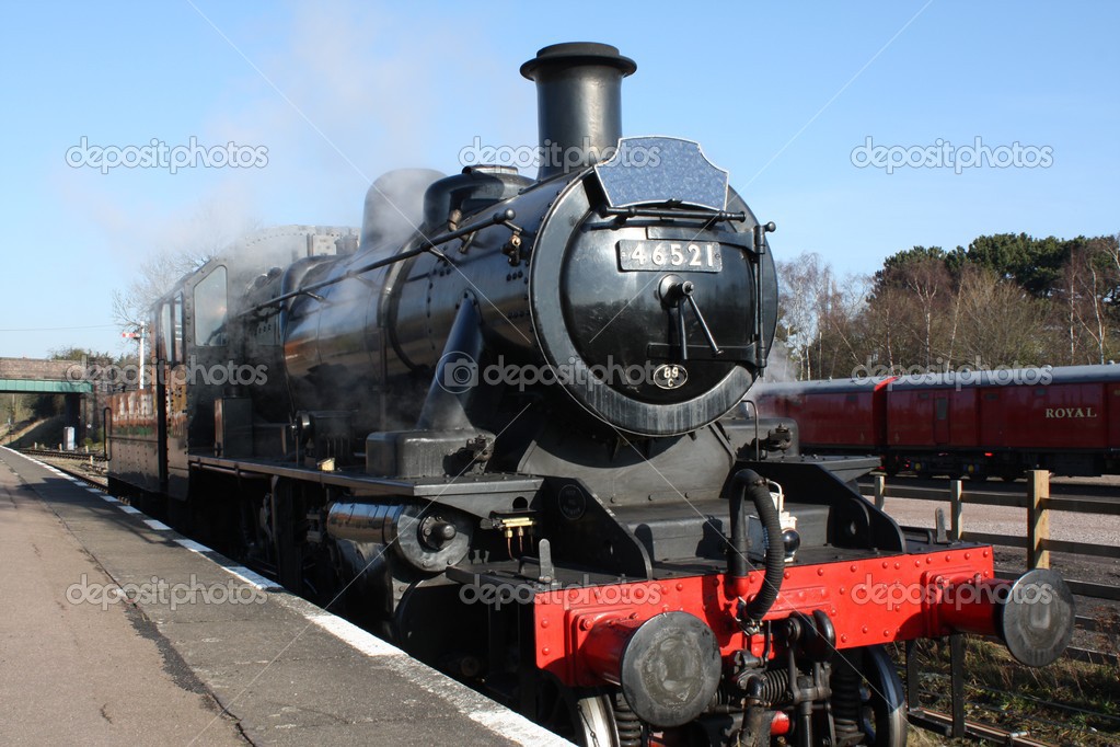Steam train engine on platform — Stock Photo © gracierose #23999691