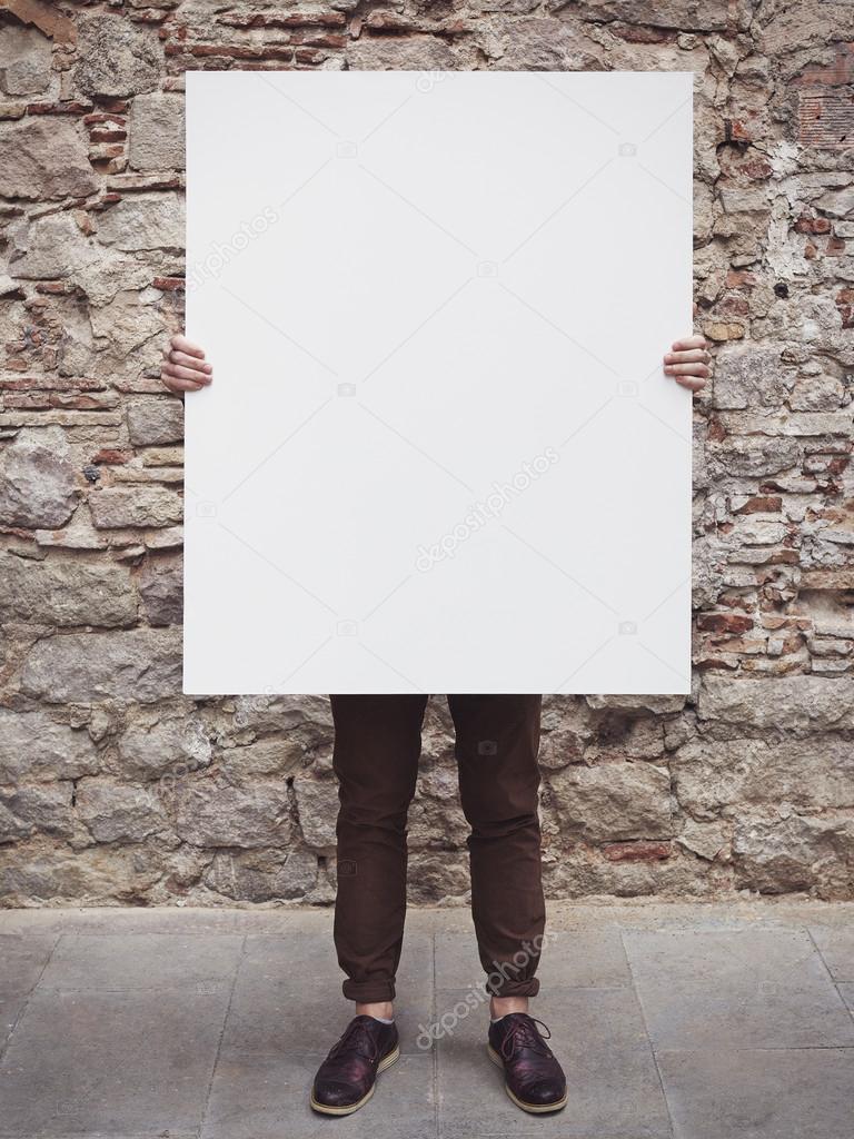Man Holding Blank Poster