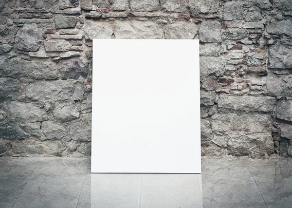 Old stone wall and blank poster - Stock Image - Everypixel