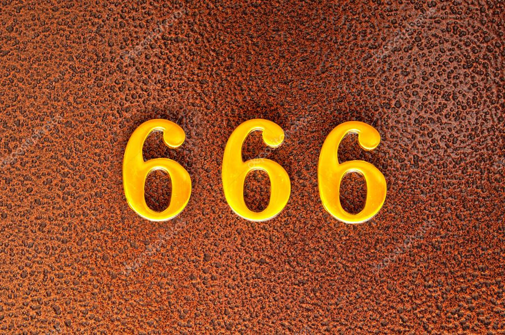 Number 666 on metal background Stock Photo by ©lipsky 30800171