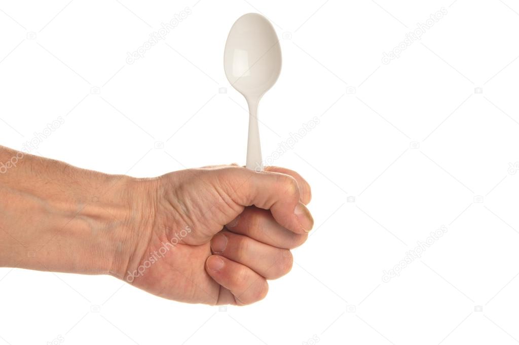 Hand holding spoon on white background — Stock Photo © lipsky #44076437